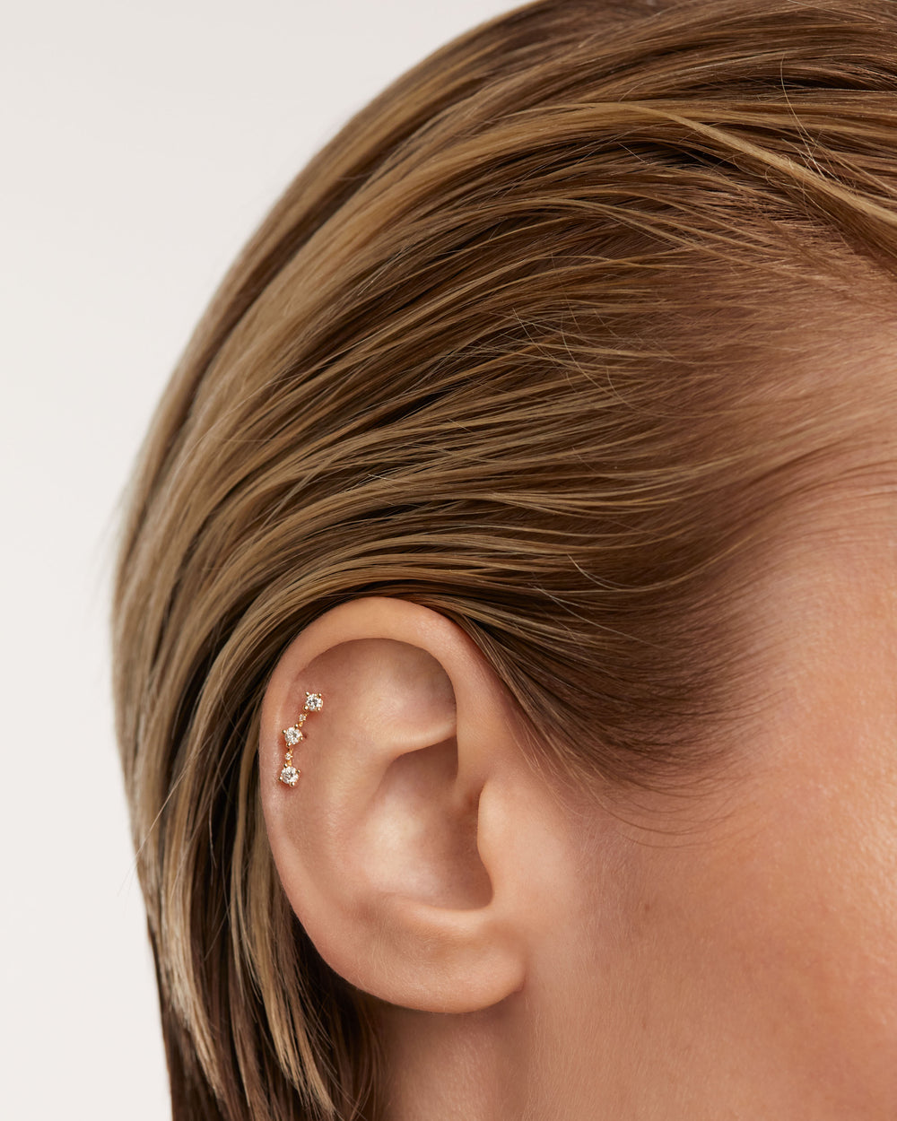Solid yellow gold ear piercing with arch shape & lab-grown diamond ...