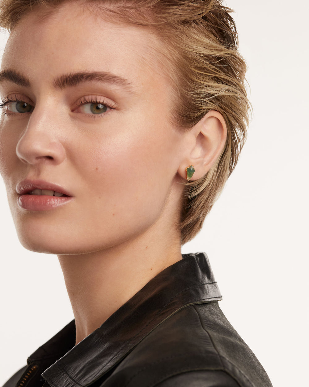 Gold-plated pin ear piercing with dark green gemstone in pointy shape ...