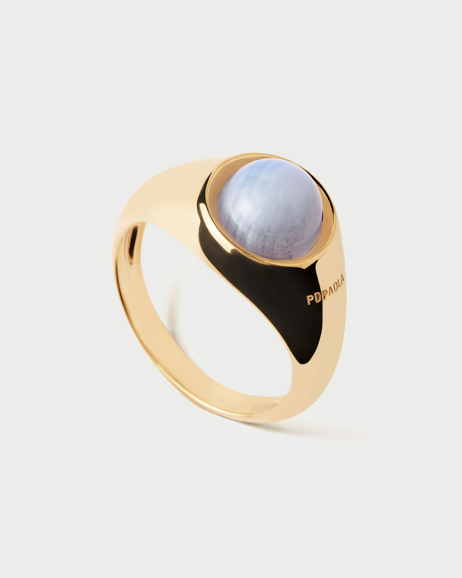 Gold-plated half-sphere signet ring topped with an oval blue gemstone ...