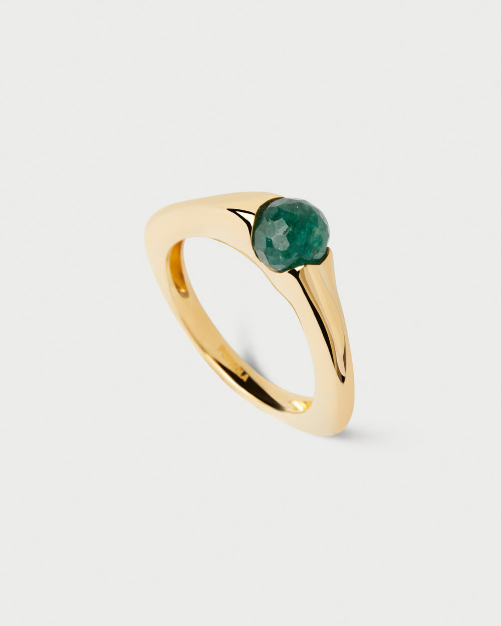 Gold-plated organic shape stacking ring featuring a round cut green ...