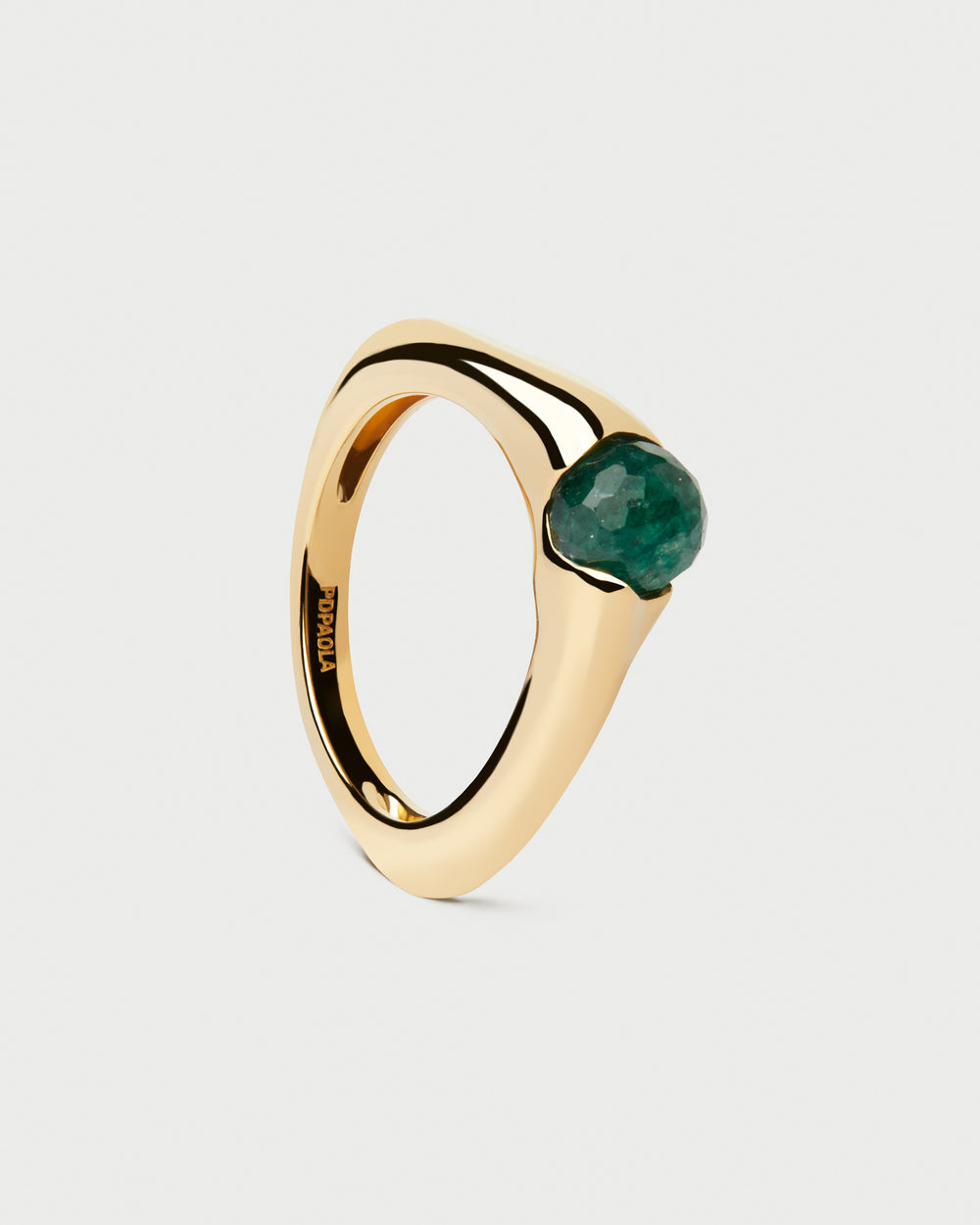 Gold-plated organic shape stacking ring featuring a round cut green ...
